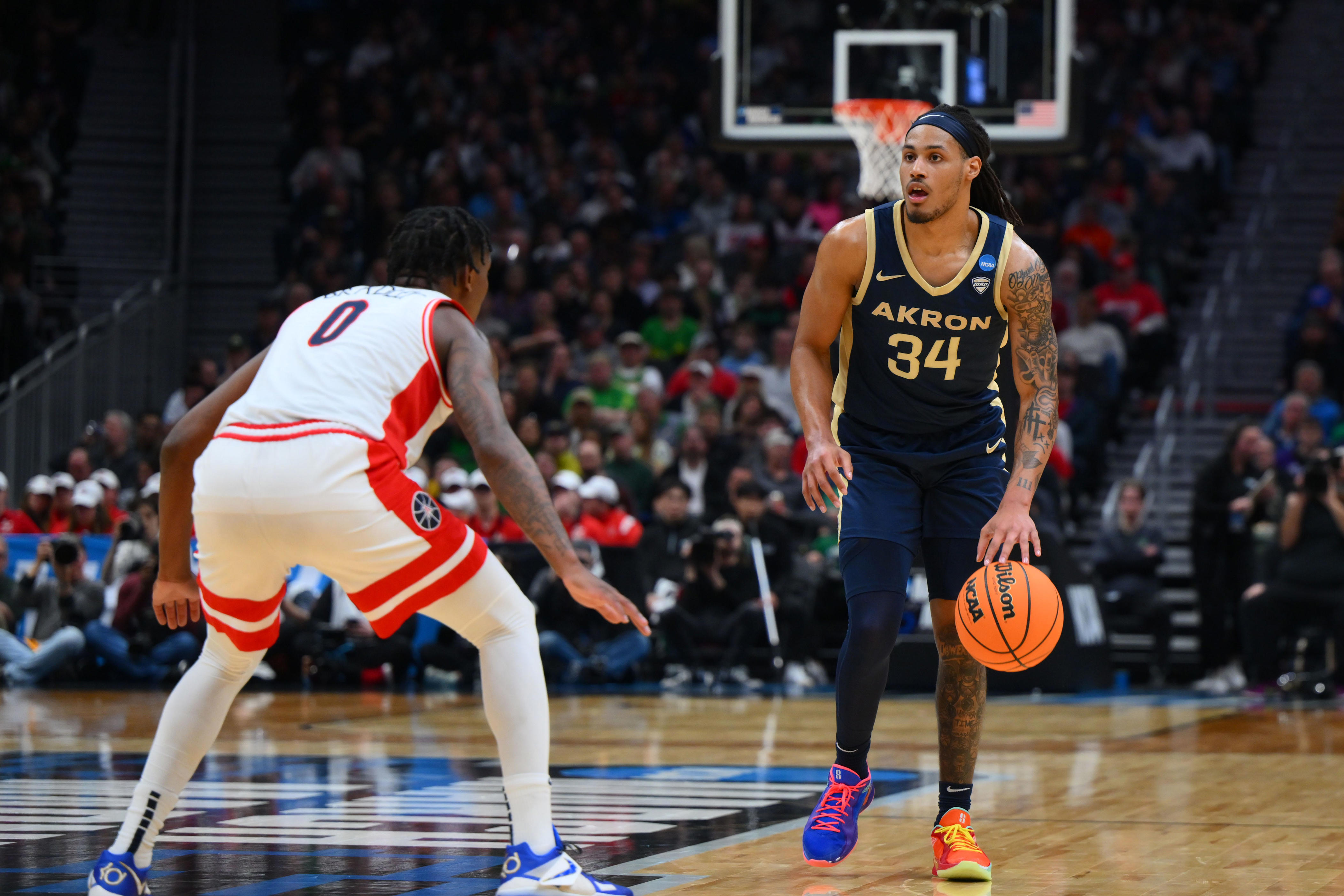 With Nate Johnson leading way, key Zips expect to return. So March ...