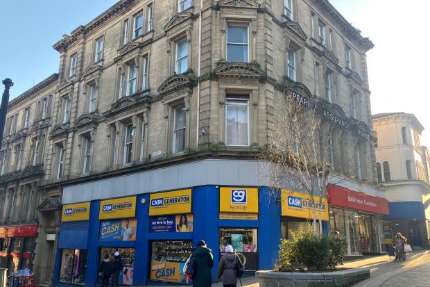 National company's plan to keep unauthorised signage on listed building ...