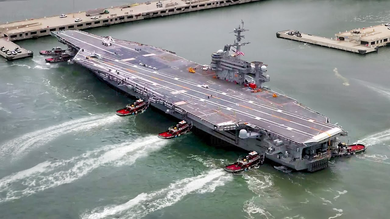 Watch how the US Navy expertly docks massive aircraft carrier