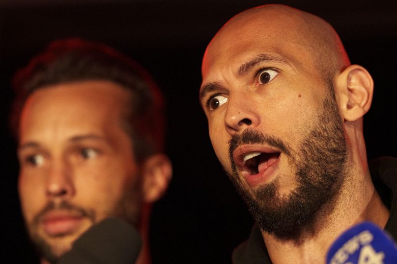 Tate brothers return to Romania to clear their names in court