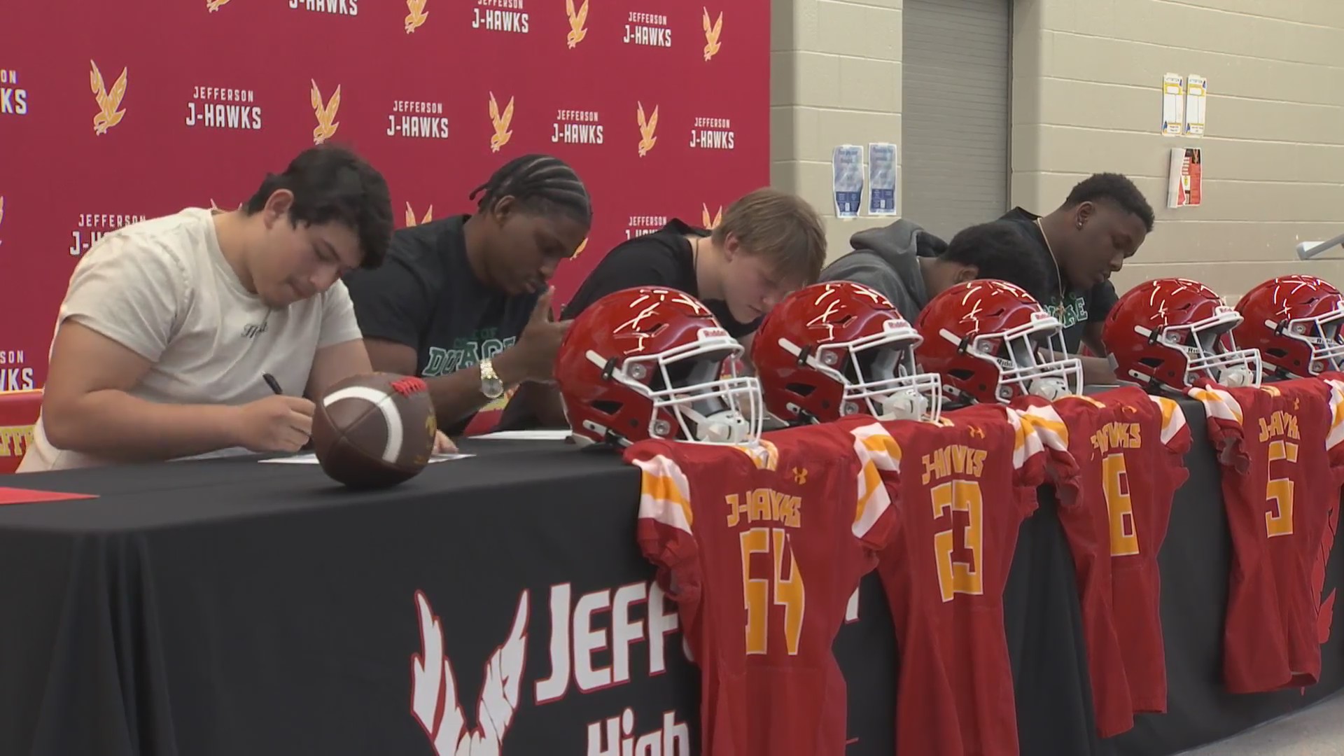 Jefferson football players sign with college programs