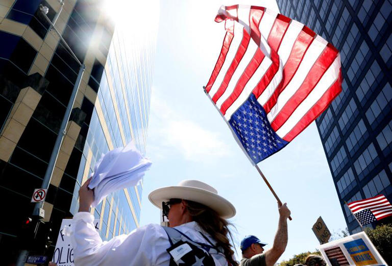 Hundreds rally in Westwood to protest Trump, Musk's government cuts ...