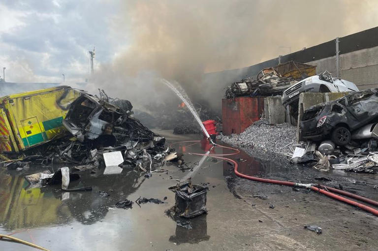 Inside the scene of destruction after huge scrap yard fire