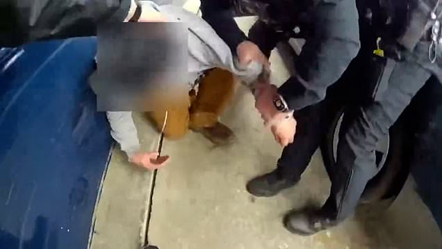 Bodycam shows police busting car window and arresting Lego thief