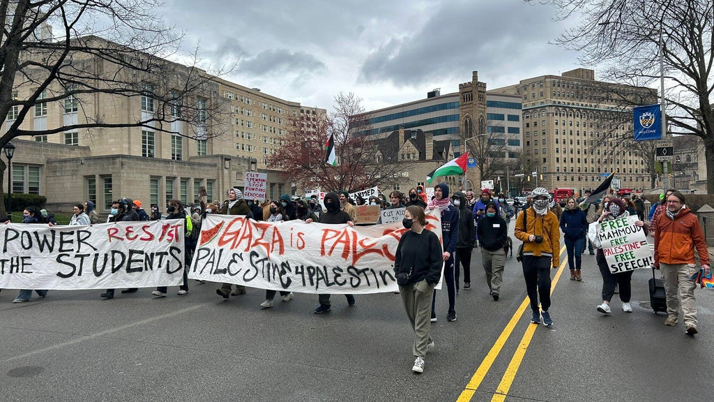 Pro-Palestinian protesters defy university order, stage march across ...