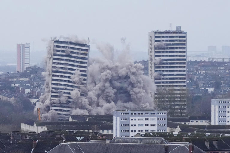 Three 26-storey tower blocks vanish in seconds after they're demolished ...