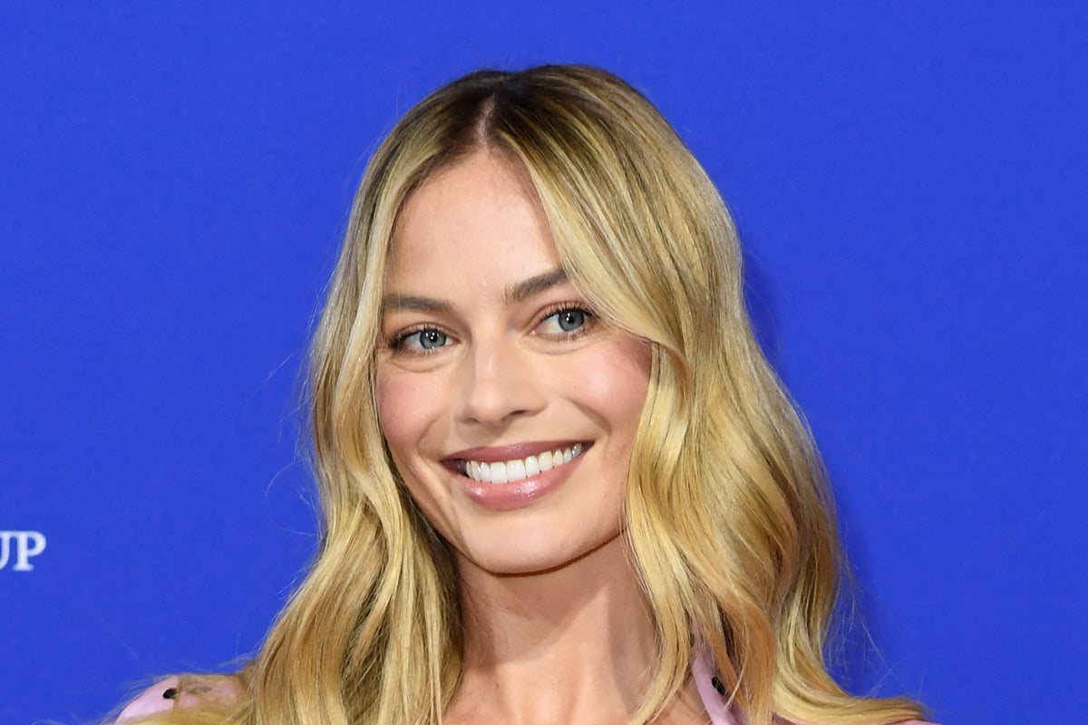 Margot Robbie wears wedding gown while filming controversial Wuthering ...