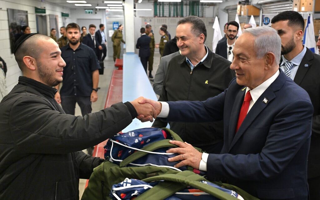At IDF draft center, PM says Israel defeating enemies with ‘tremendous ...