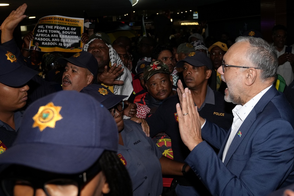 Expelled South African ambassador returns home and says will wear US ...