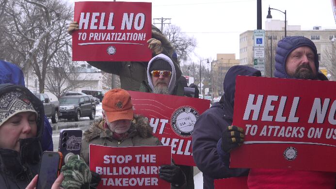 Postal workers rally against potential takeover by Trump administration ...