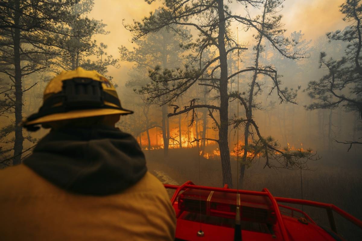 Wildfires prompt evacuation in the Carolinas as New Jersey crews battle their own blaze