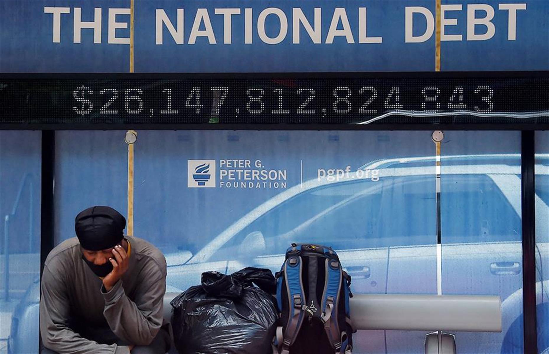 How does the average person's debt compare across the world?