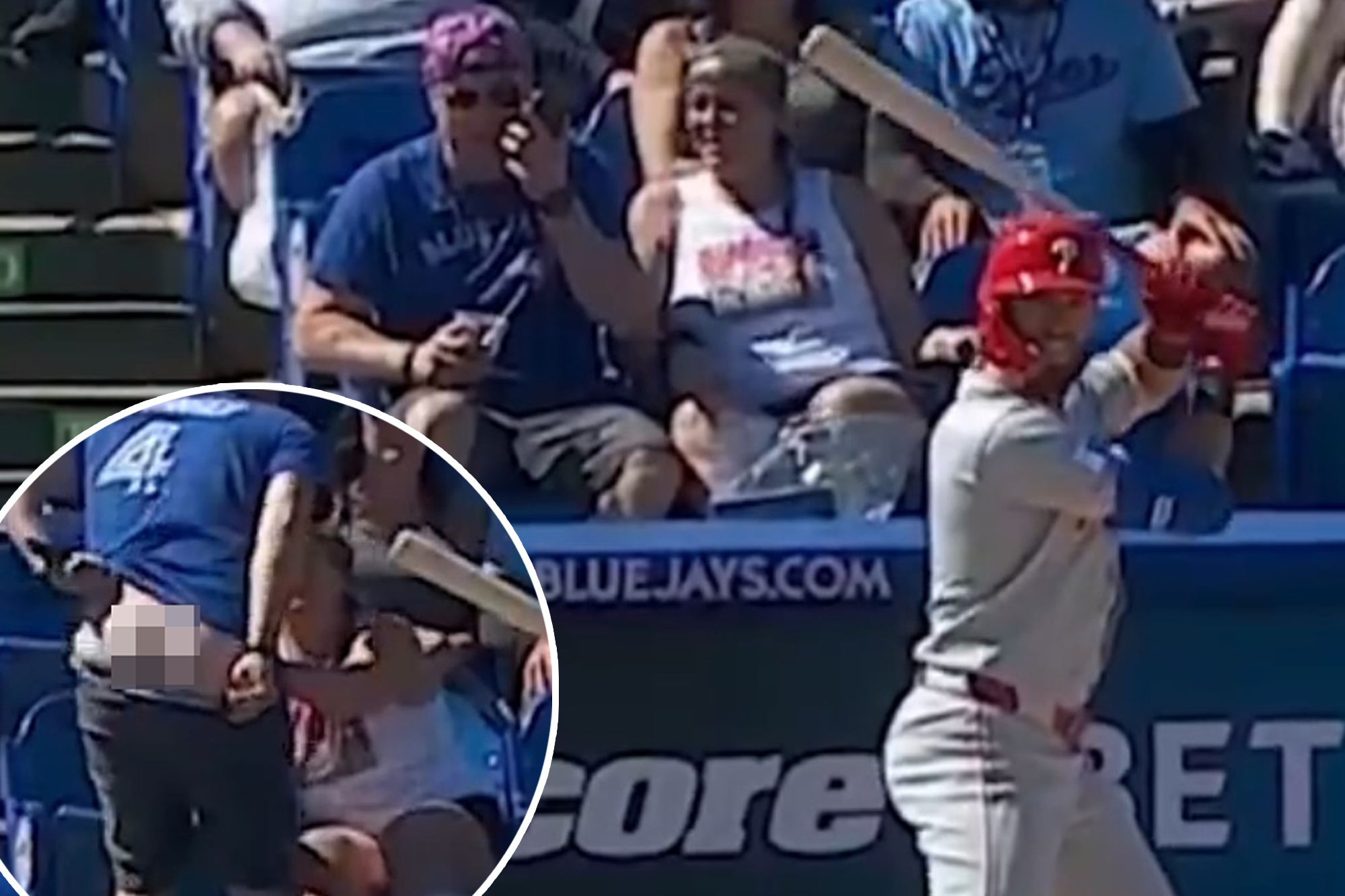 Blue Jays fan moons TV camera during spring training game as woman tries desperately to stop him