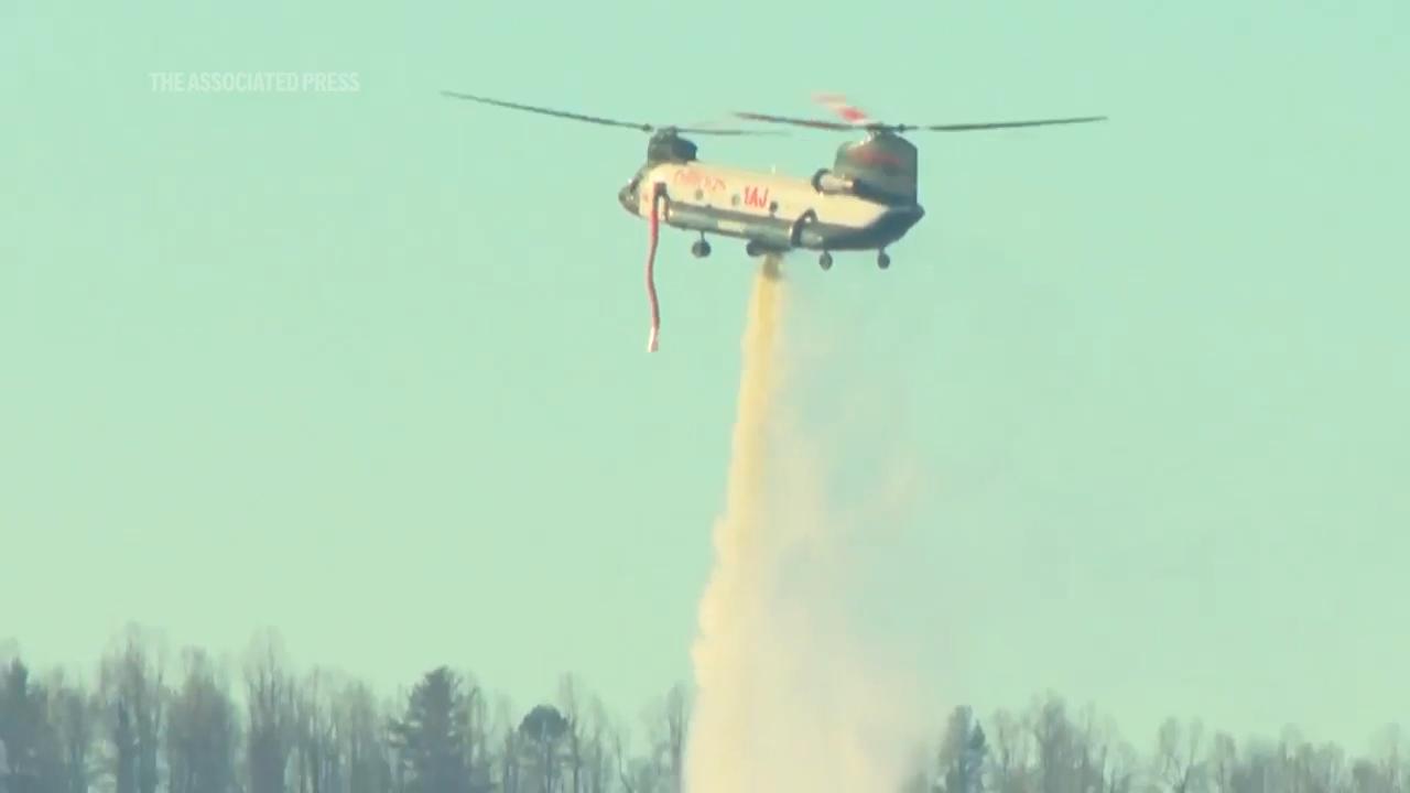 Wildfires prompt evacuations and an emergency declaration in the Carolinas