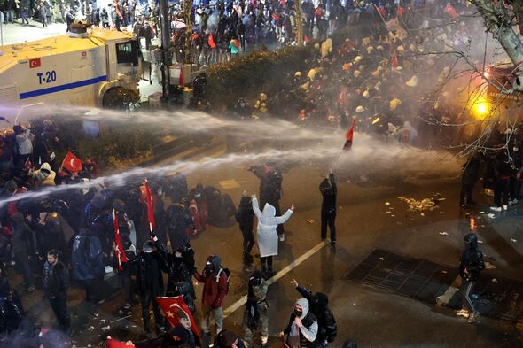 Turkey protestors violently clash with riot police after president's ...