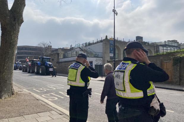 Blaring horns and police on scene for large city centre gathering
