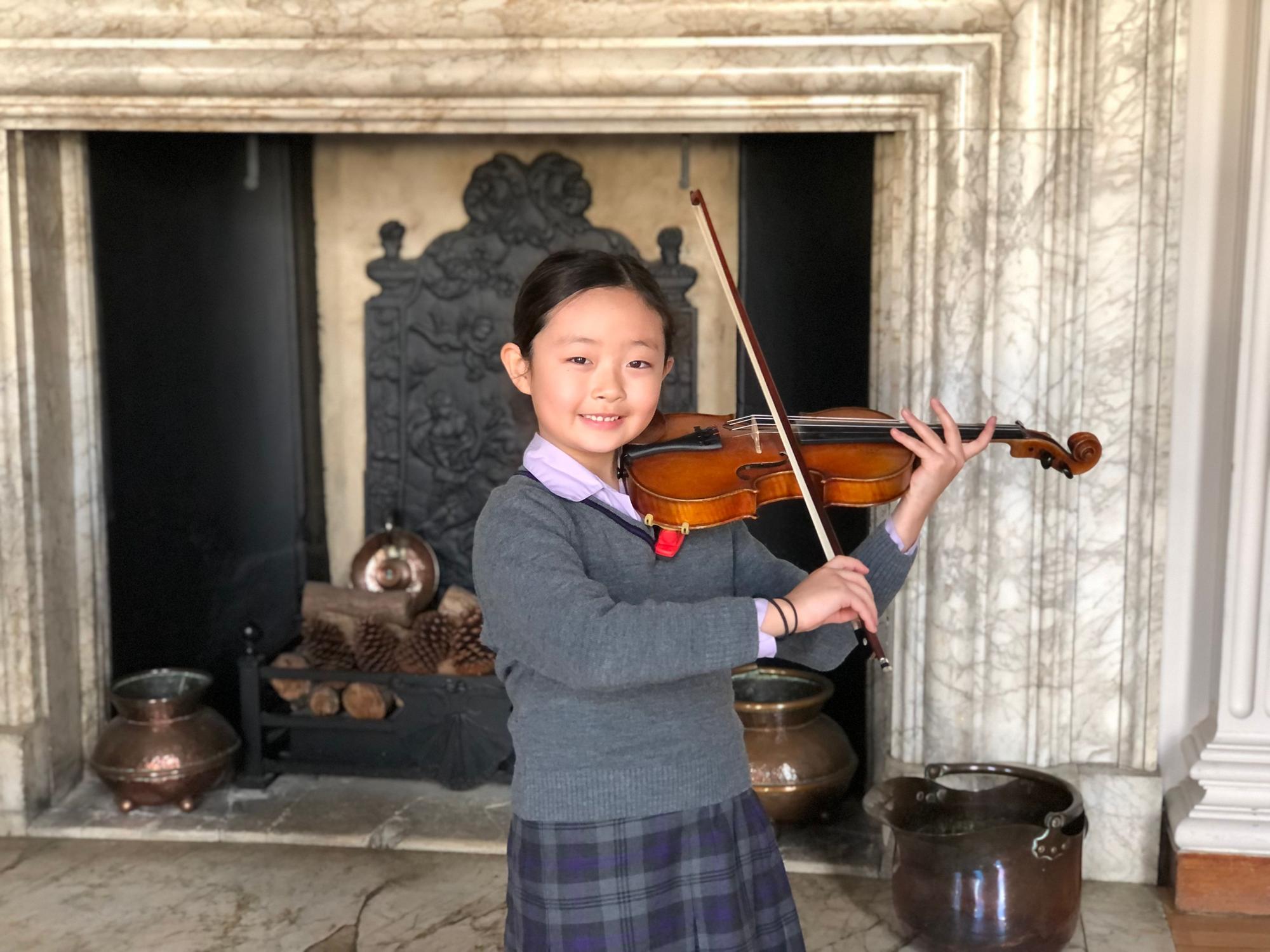 Eight year-old violinist from Kimbolton School achieves distinction