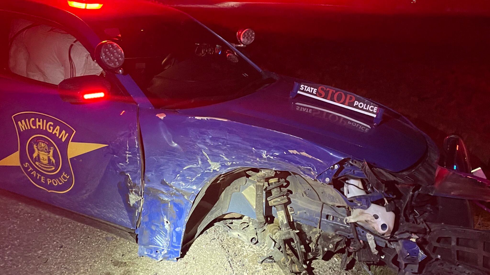 MSP patrol vehicle hit while policing traffic crash on I-69