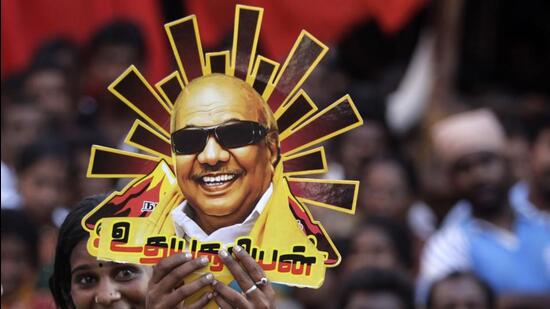 Leader lording over the masses from hoardings