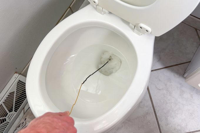 No Plunger? No Problem: How To Unclog Toilet With a Hanger