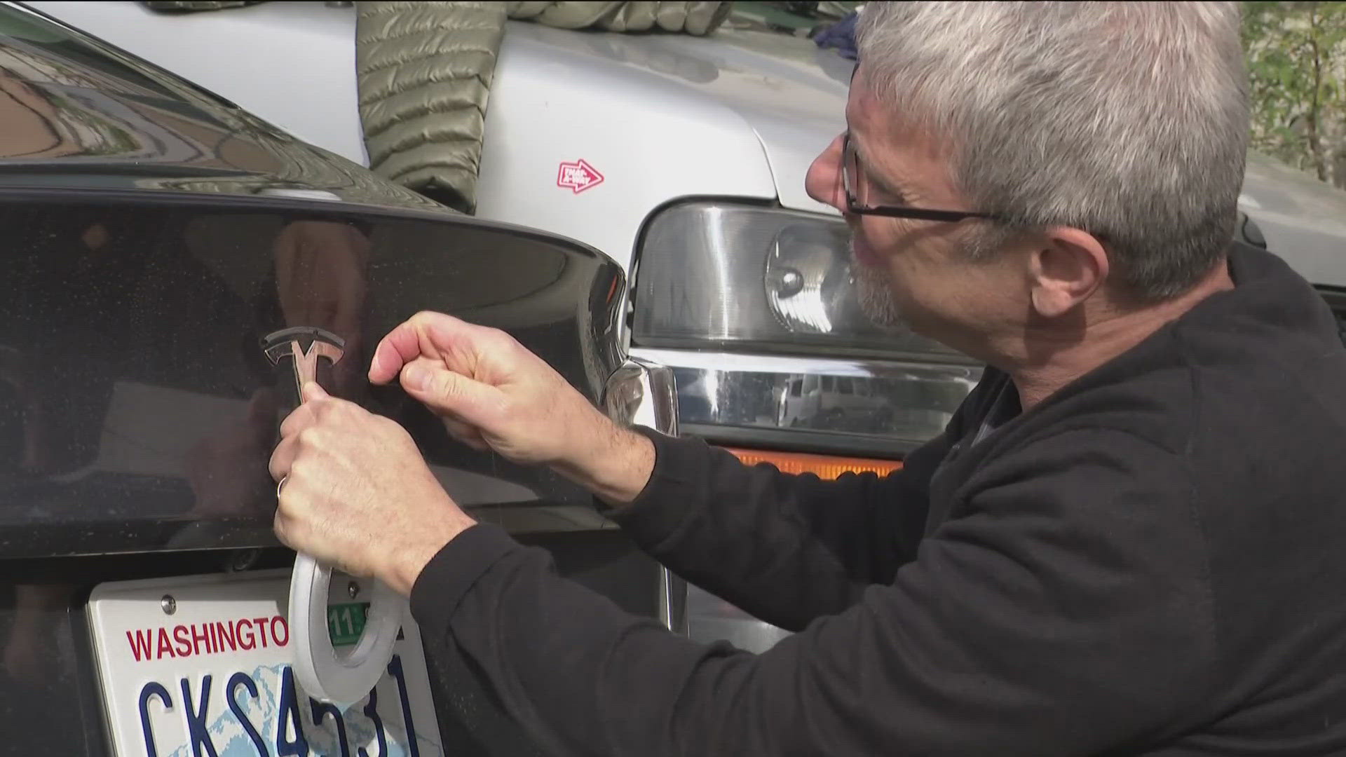 Tesla owners remove logos amid growing backlash against Elon Musk