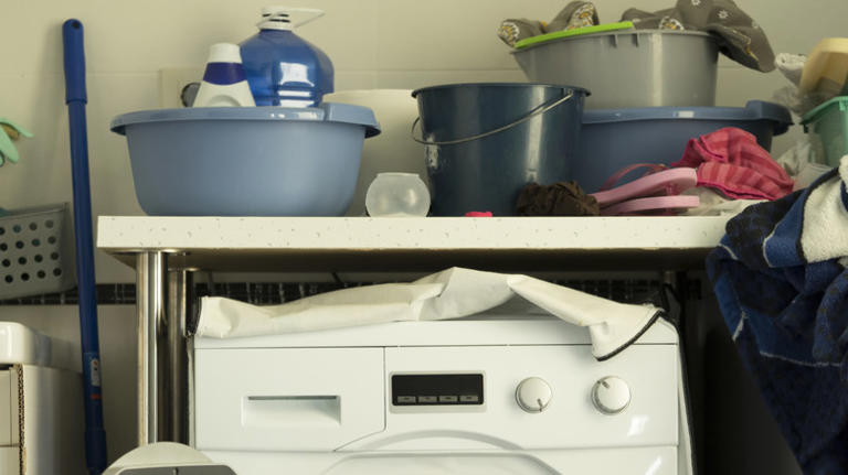 Declutter Your Laundry Room By Tossing These 13 Commonly Stored Items