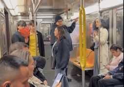 Woman Confronts Man in MAGA Cap on Subway, Tries to Grab Hat