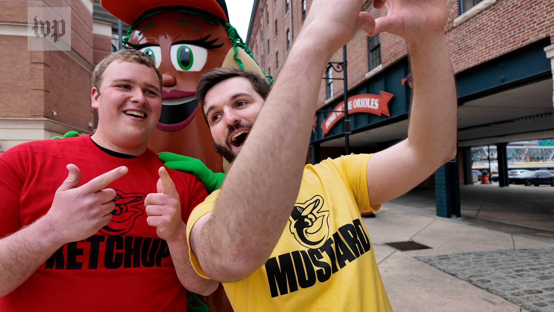 Can these reporters become the Orioles racing hot dogs?