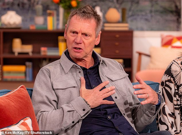 England legend Stuart Pearce reunites with cabin crew member who helped ...
