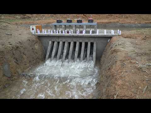 Build a small dam with 8 powerful water outlets