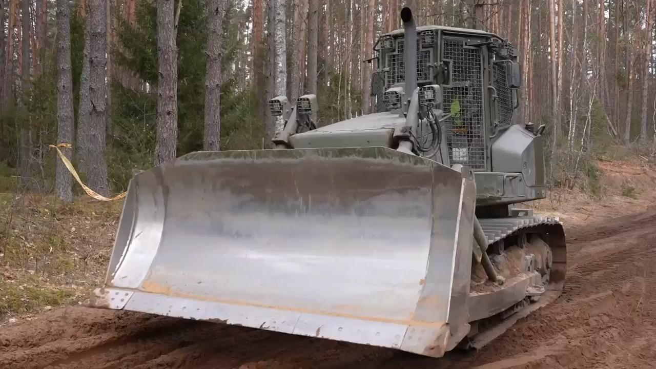 US armored vehicle missing in Lithuania pulled from swamp but fate of 4 ...