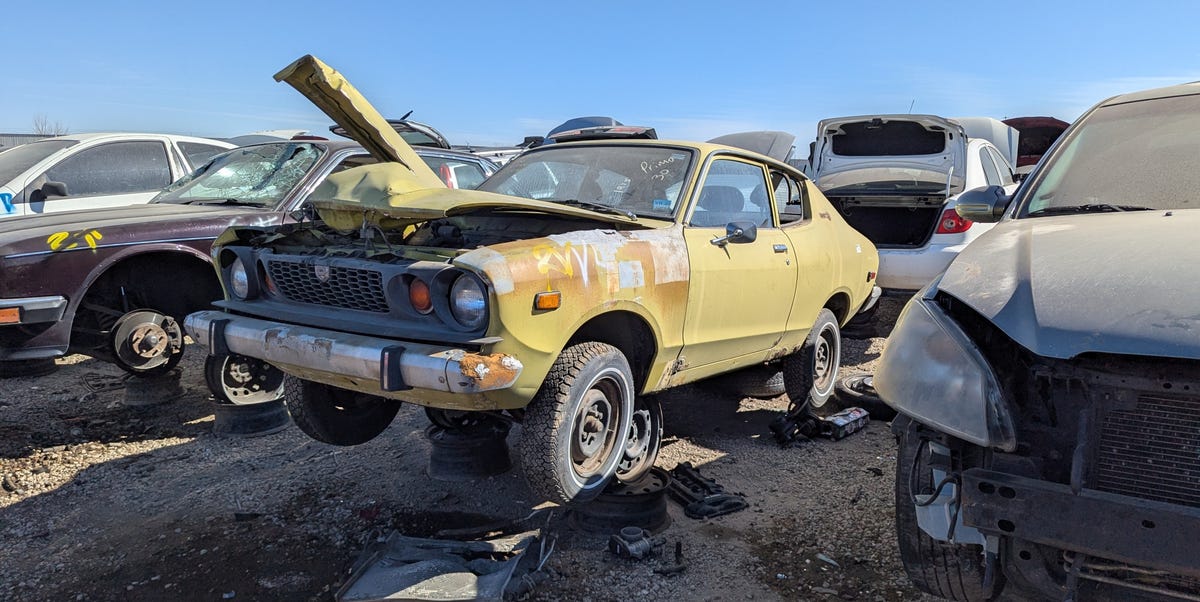 1975 Datsun B210 with 7-Padlock Security System Is Junkyard Treasure
