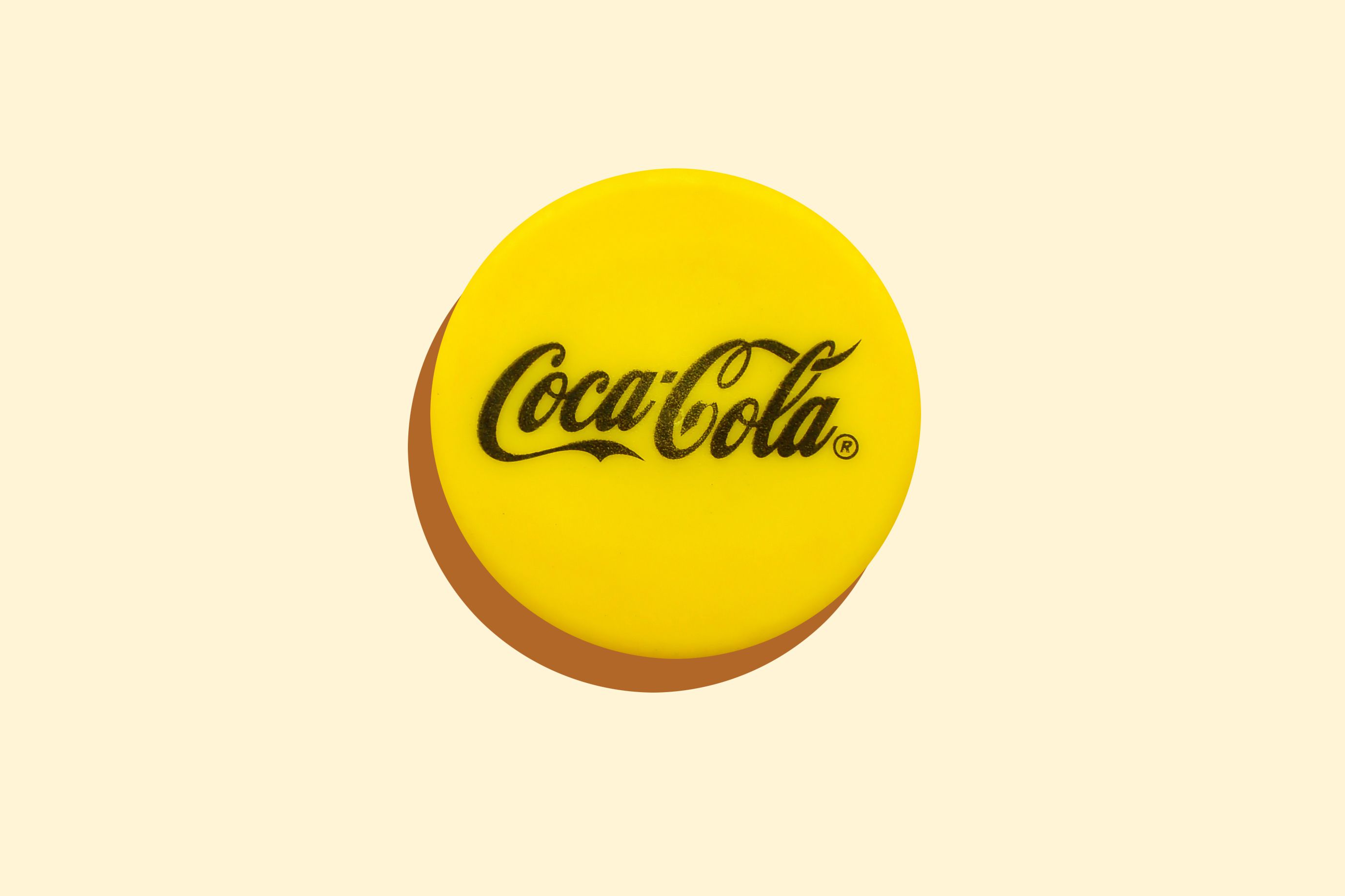 Why You’re Seeing Yellow Caps on Coke Bottles This Season