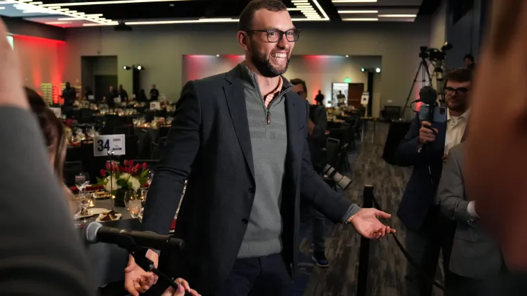 Stanford football hires beloved Heisman Trophy winner's former coach as ...