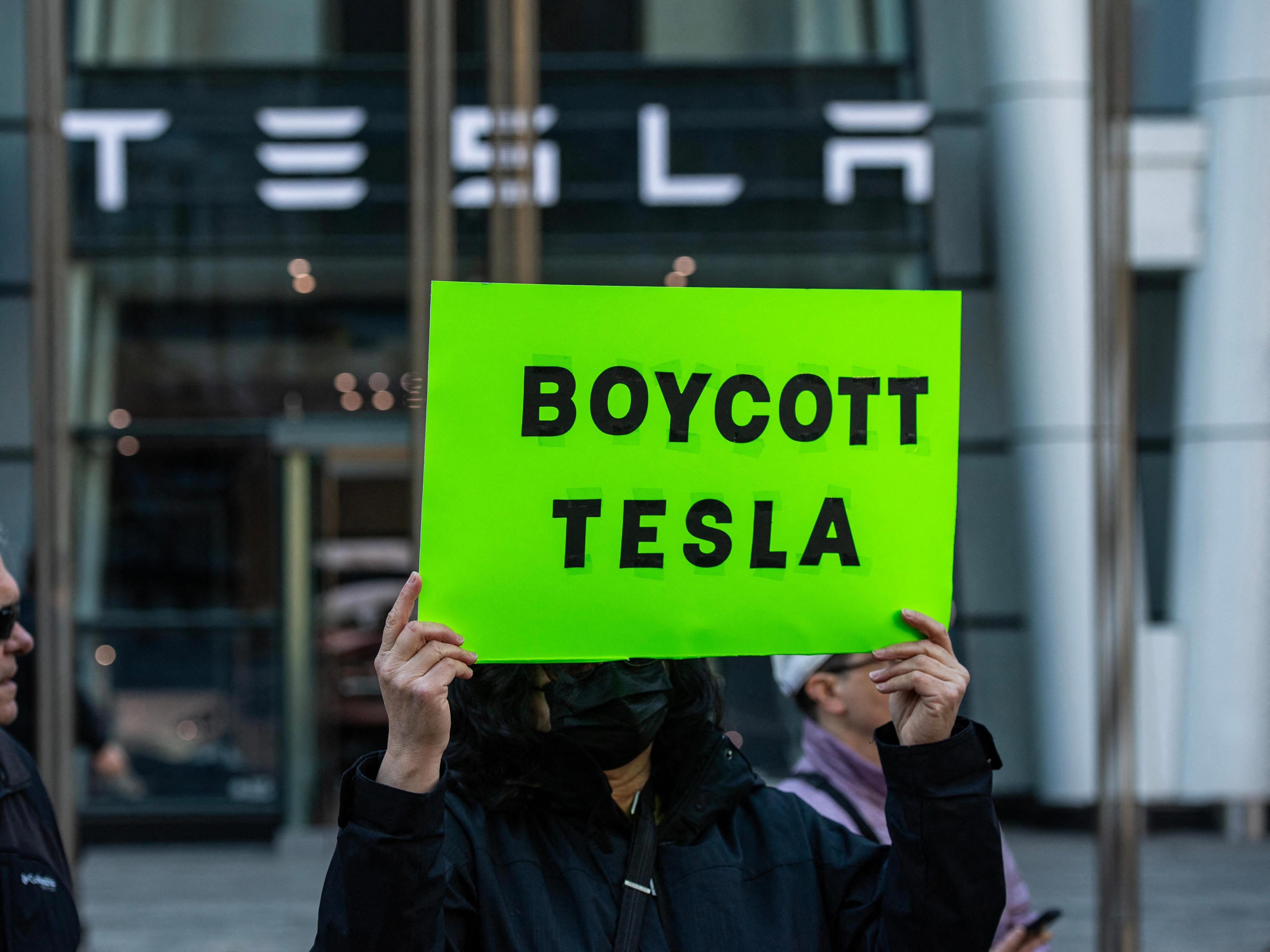 Tesla sent a video to sales staff before protests that featured smiling ...
