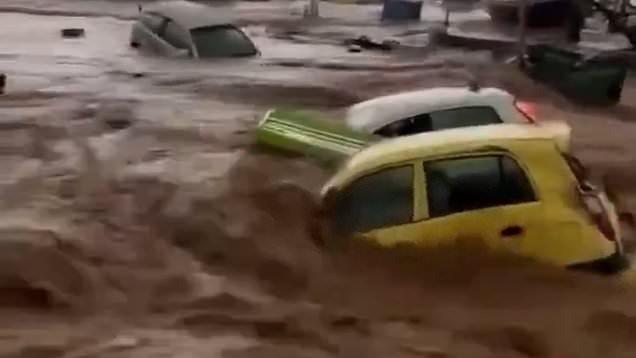 Storm batters Greek island of Paros causing flood to sweep away cars