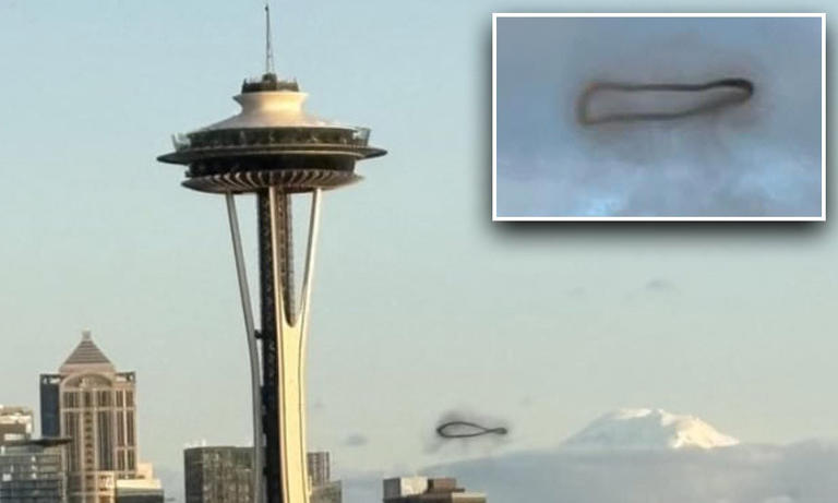 Mysterious black ring is spotted hovering in skies above Seattle