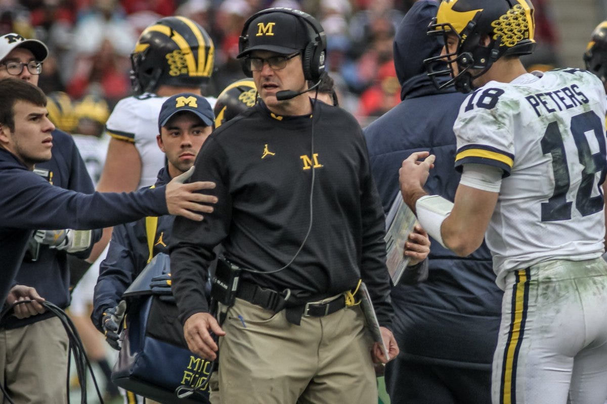 Former Michigan football head coach Jim Harbaugh reacts to Matt Weiss ...