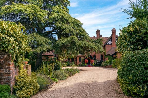 Two men arrested on suspicion of fraud and theft from manor hotel