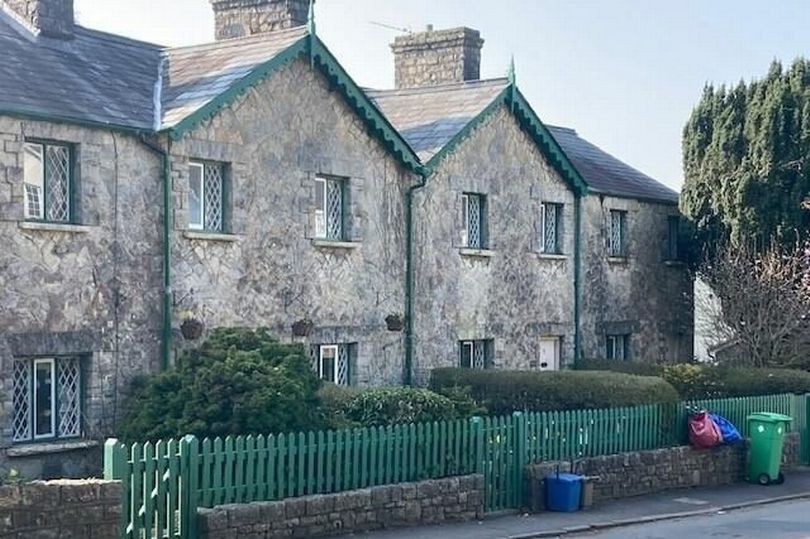 14 photographs of two cottages in a Cardiff village offering a ...
