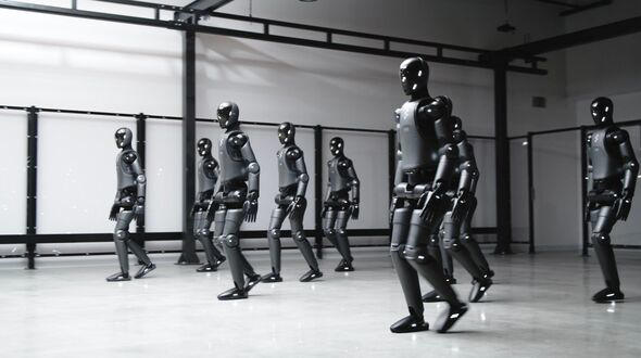 Eerie video shows robot 'army' marching after AI teaches them to walk ...
