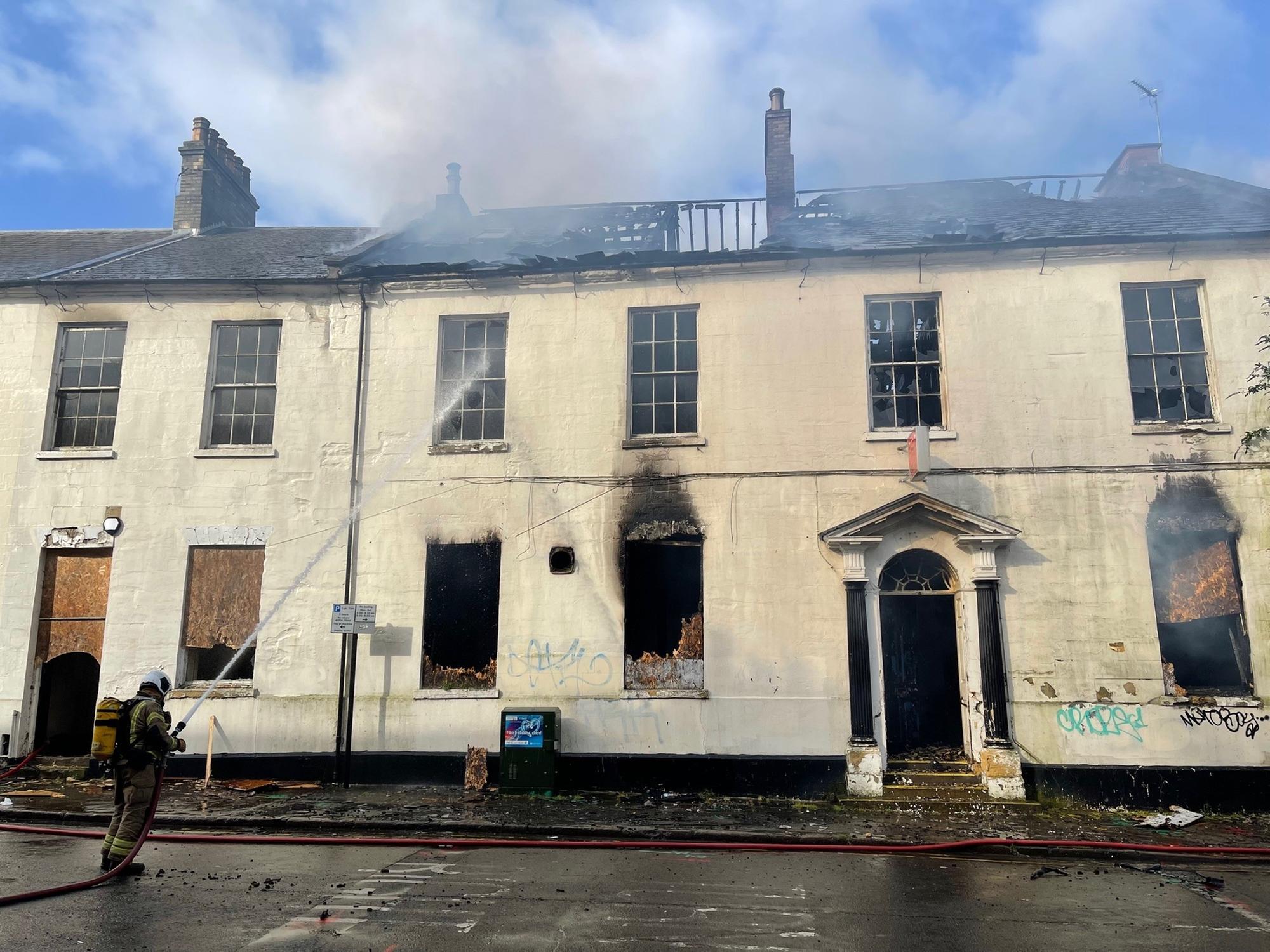 Road remains closed as police cordon still in place in Northampton town ...