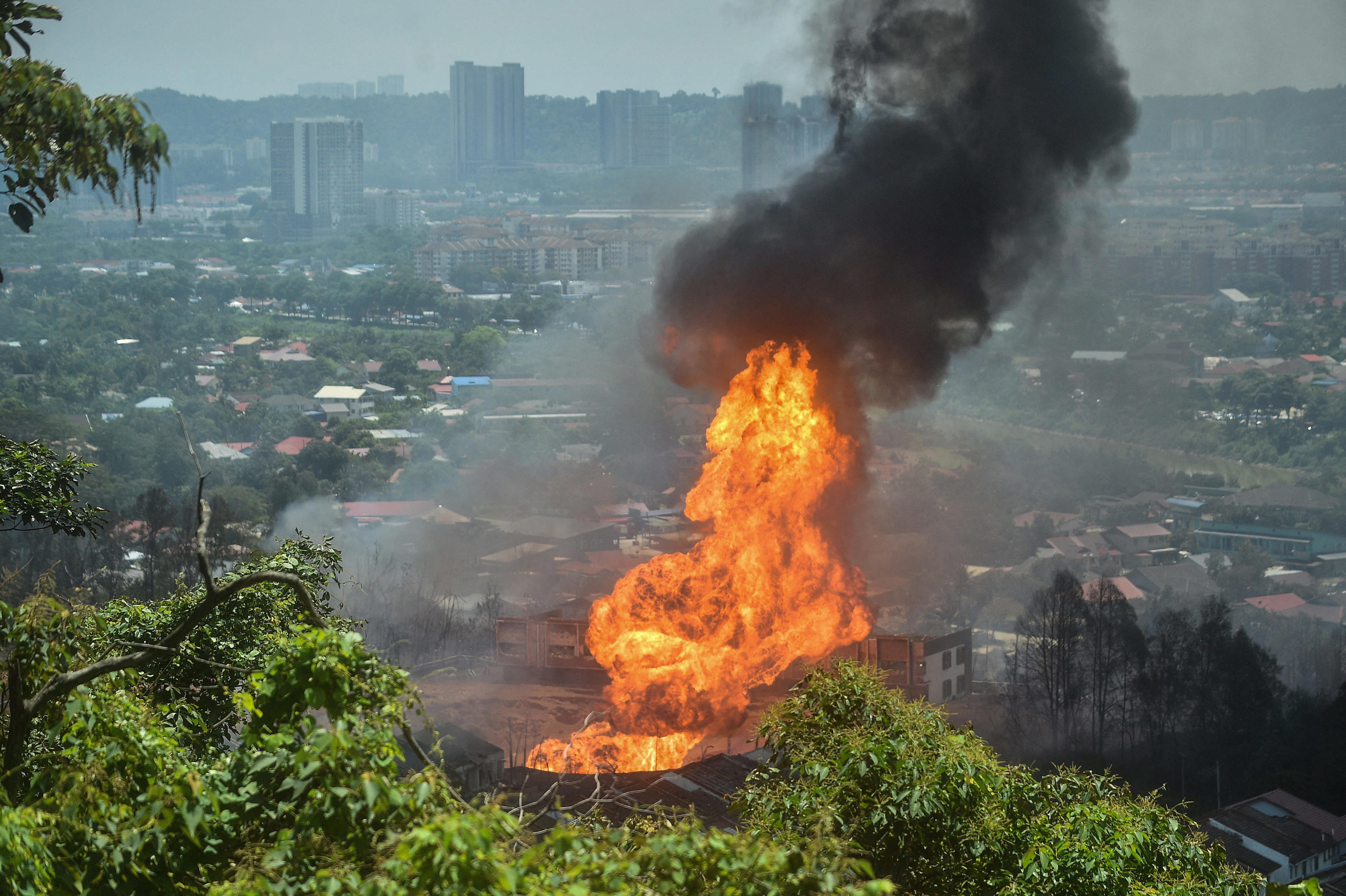 Photos show dramatic fire near Malaysian capital
