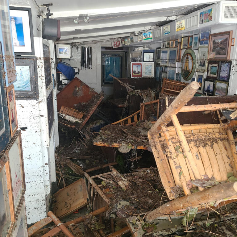Customer finds cafe sign in hurricane debris, returns it to stunned owner