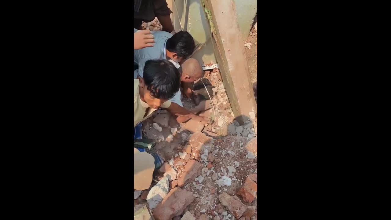 Villagers dig through rubble to save girl buried neck-deep in Myanmar ...