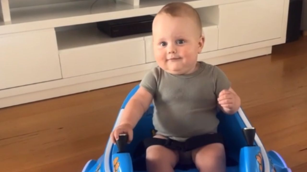 Toddler is delighted to ride on his new bumper car *Wholesome*