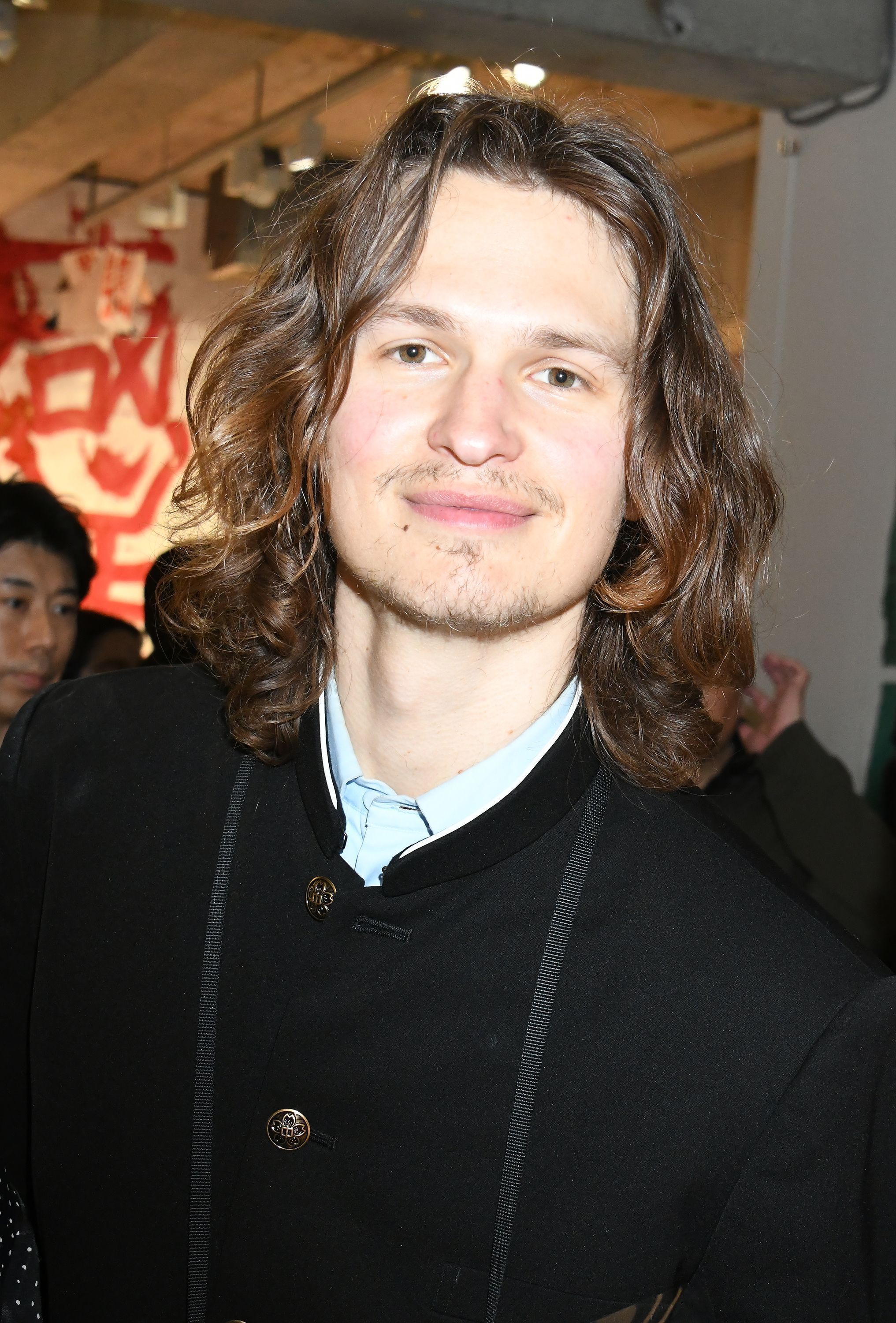 Ansel Elgort shows off shoulder-length hair during rare red carpet ...