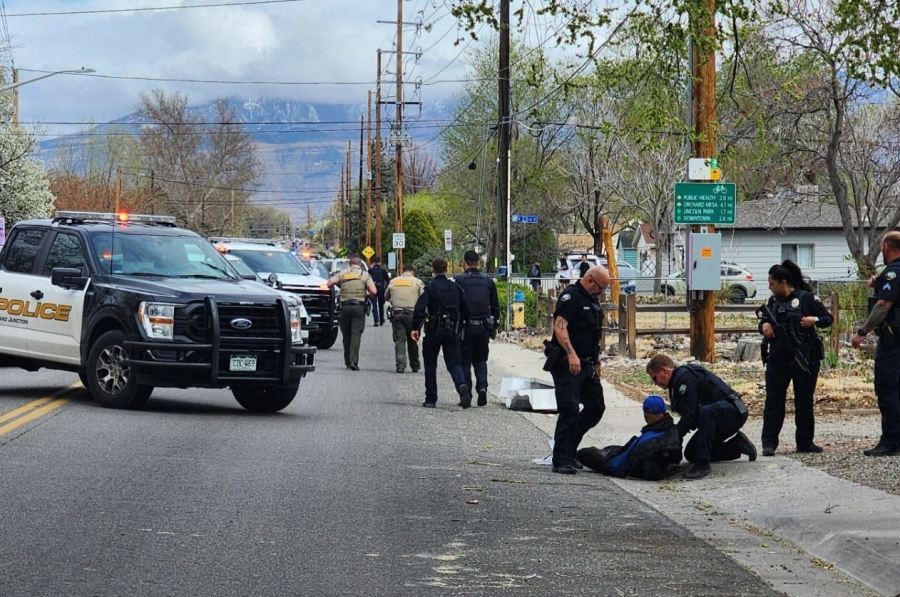 Man arrested after pointing plastic firearm at passing vehicles