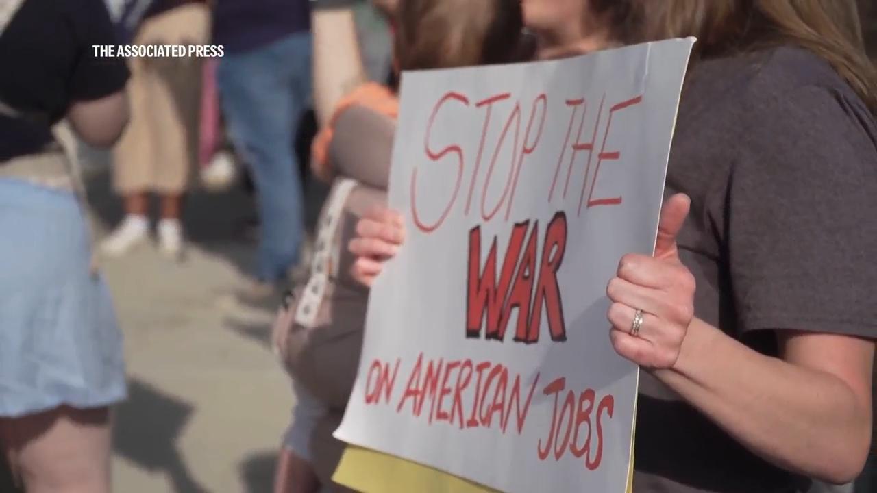 People protest layoffs at CDC in Atlanta