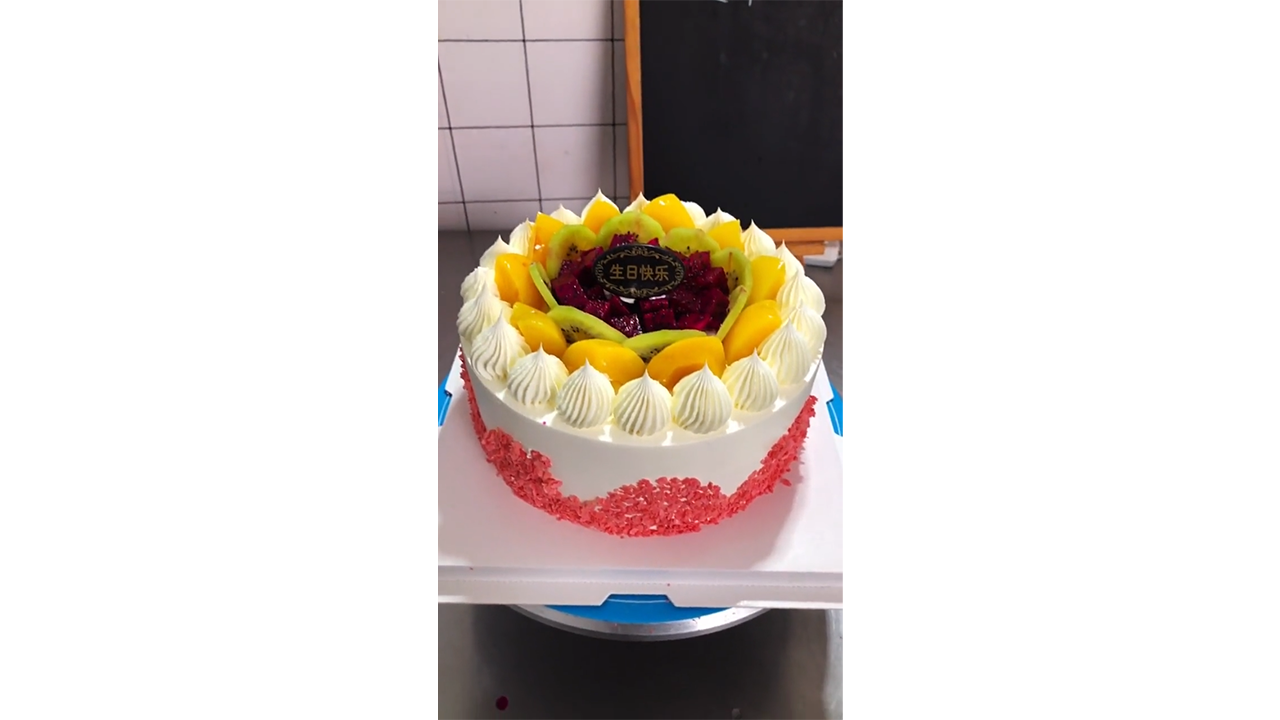 Making White With Fruity Toppings Cake